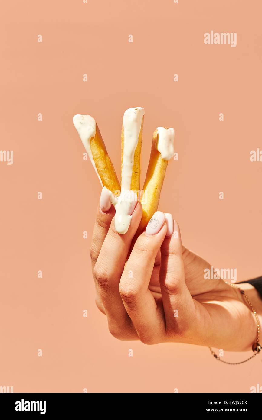 French fries hand food female hi-res stock photography and images - Alamy