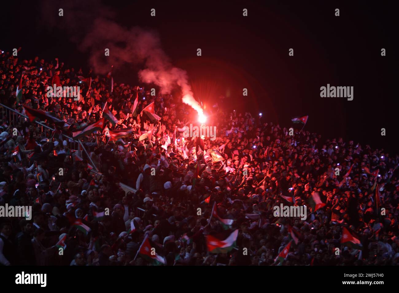 Amman, Jordan. 12th Feb, 2024. Fans cheer during a welcome ceremony ...