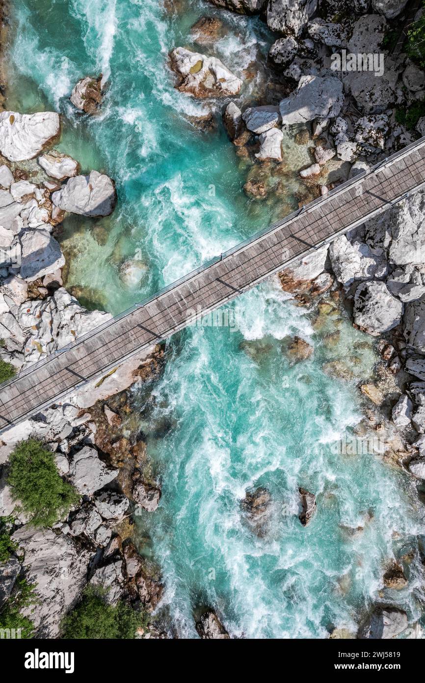 Aerial drone view over bridge at Soca river in Slovenia, alpine scenery ...