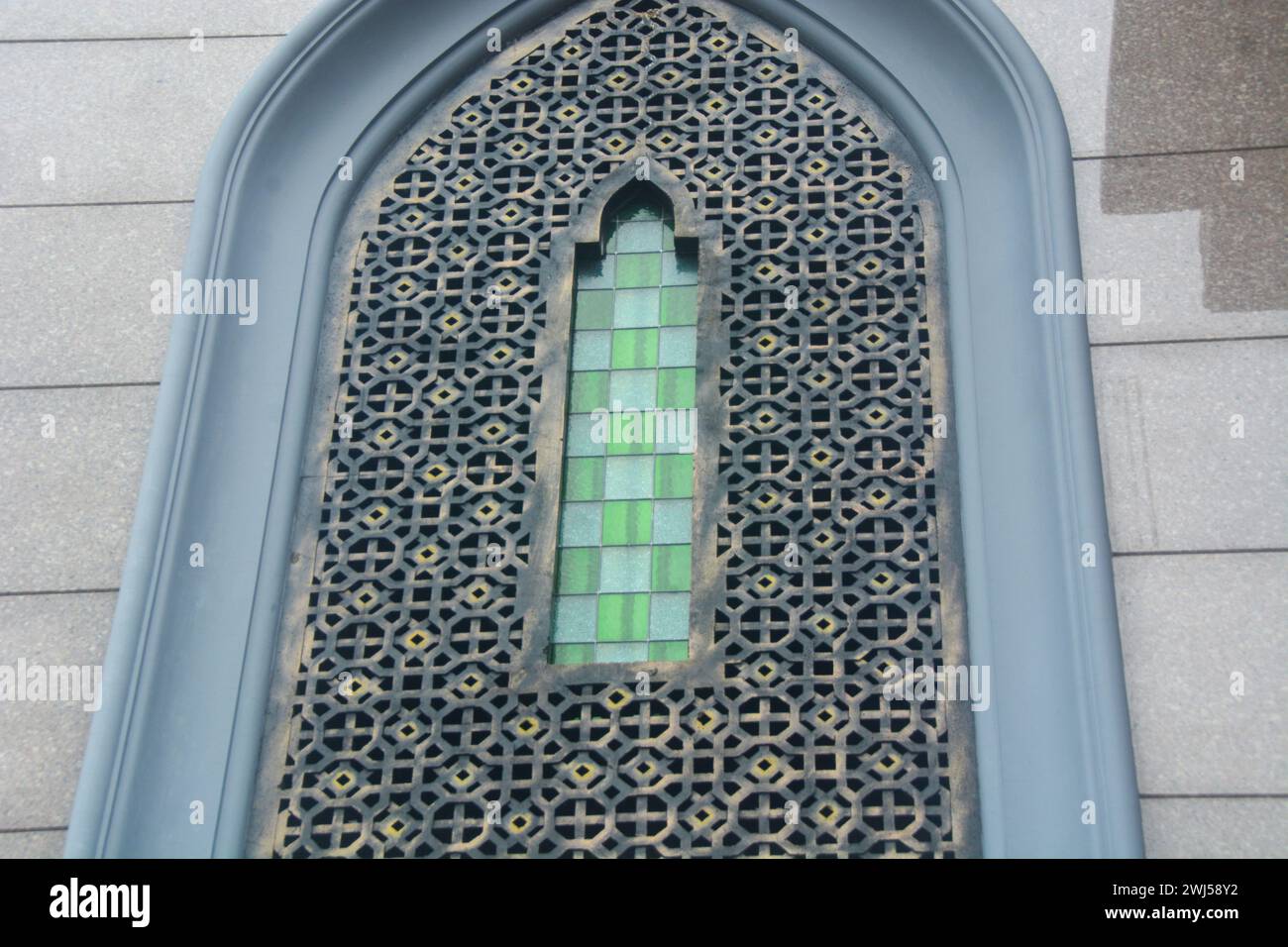 The exterior of a mosque in Wonosobo, Indonesia. mas is a place of ...