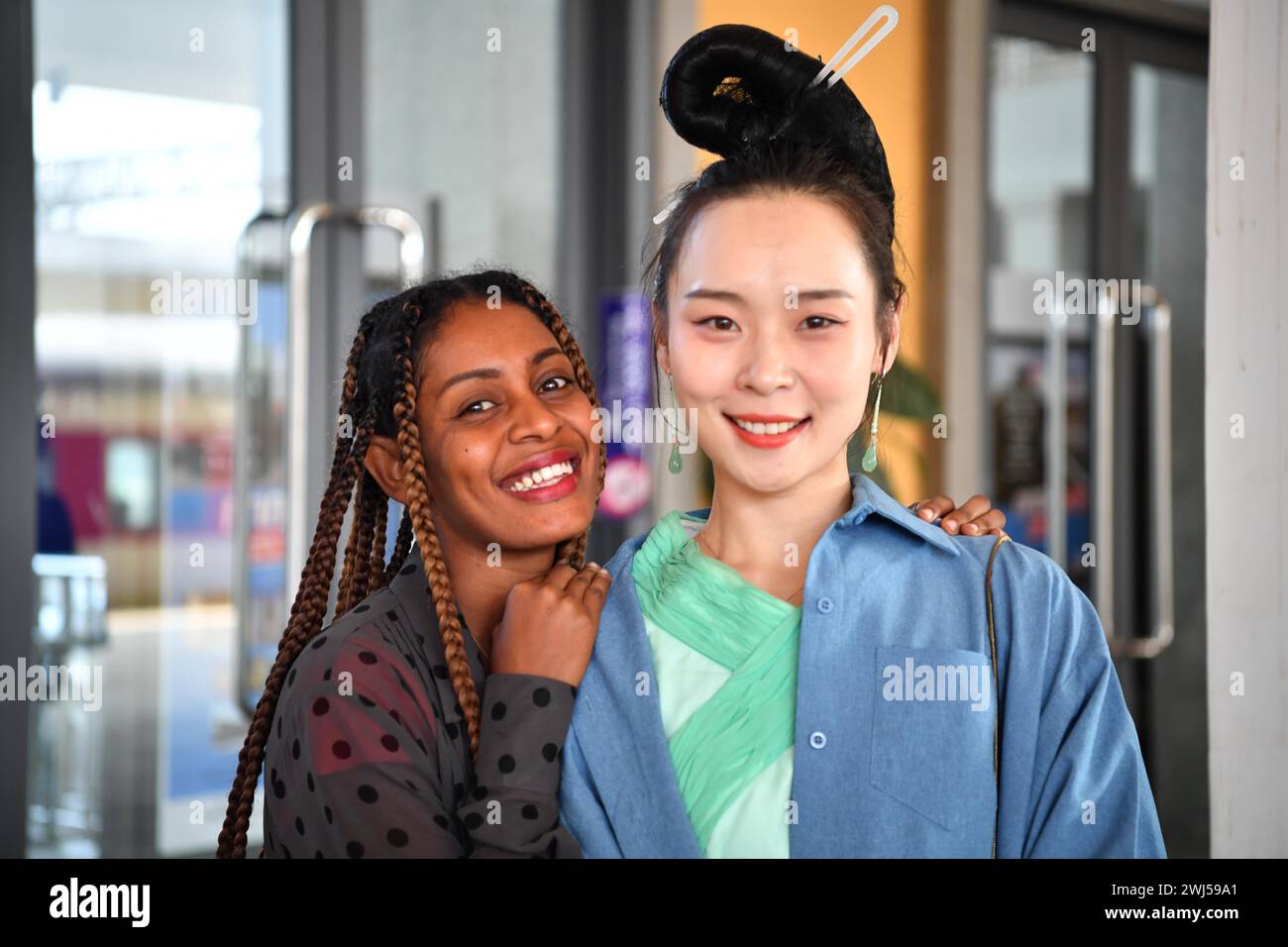 Beijing, Ethiopian capital Addis Ababa. 3rd Feb, 2024. A woman (L ...