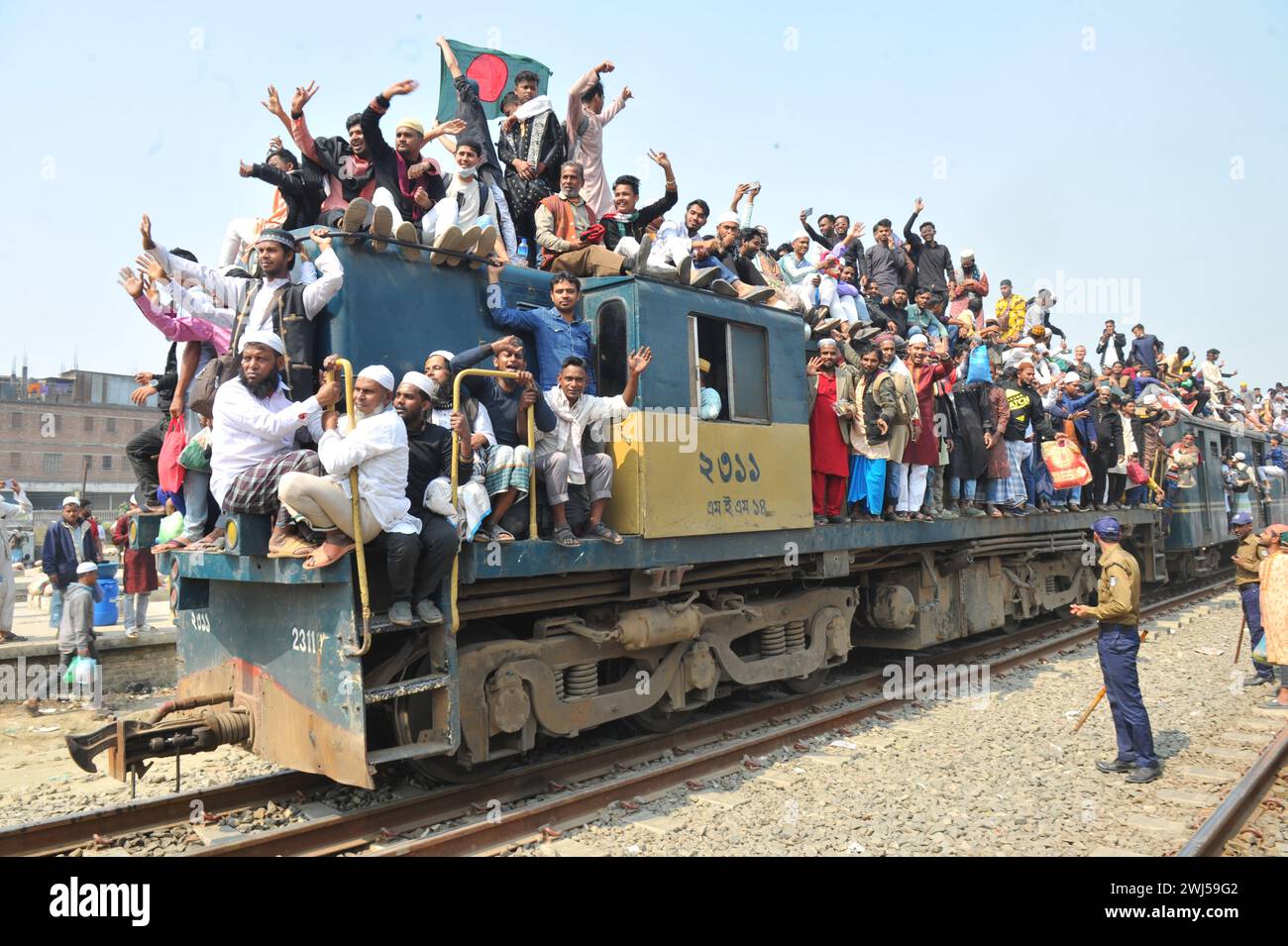 Thousands of Muslim devotees are returning home on an overcrowded train ...