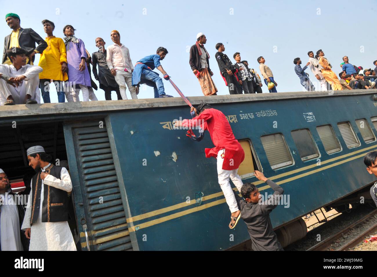Thousands of Muslim devotees are returning home on an overcrowded train ...