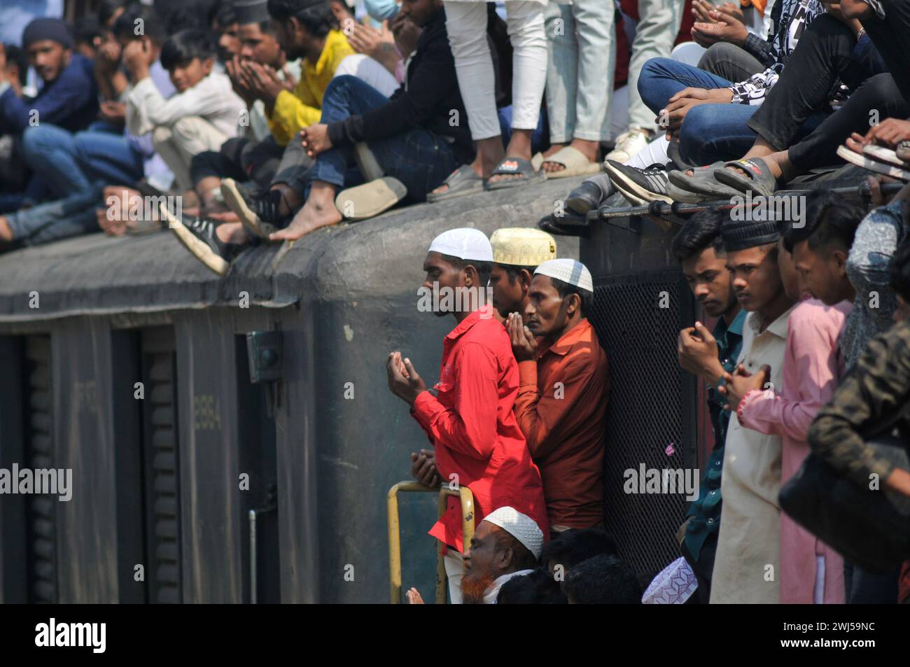Thousands of Muslim devotees are returning home on an overcrowded train ...