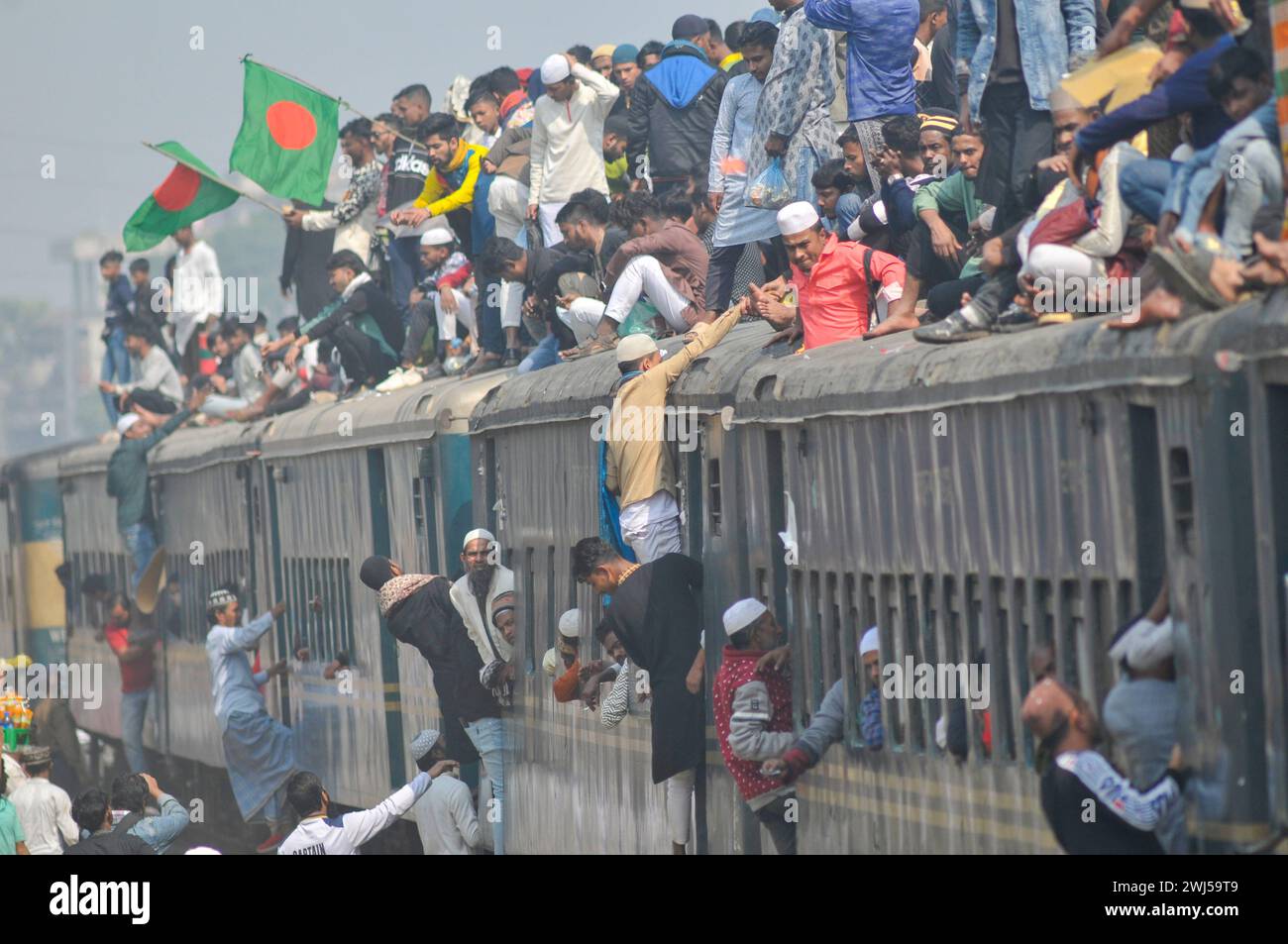 Thousands of Muslim devotees are returning home on an overcrowded train ...