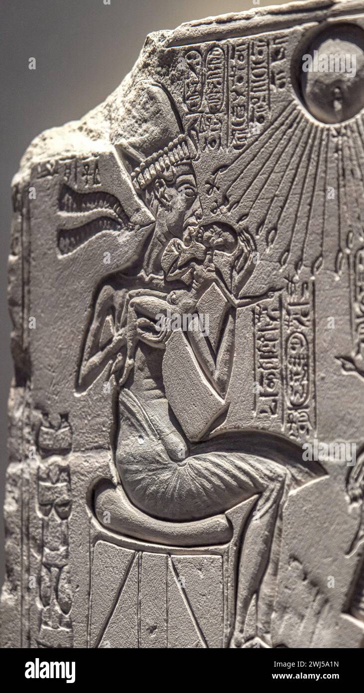 The Amarna period scene depicting the divine figure Aten with Akhenaten ...