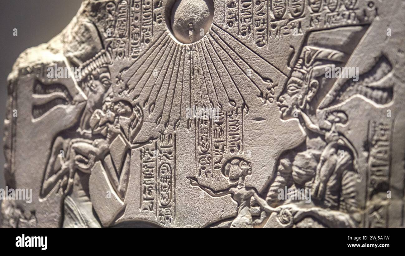 The Amarna period scene depicting the divine figure Aten with Akhenaten ...