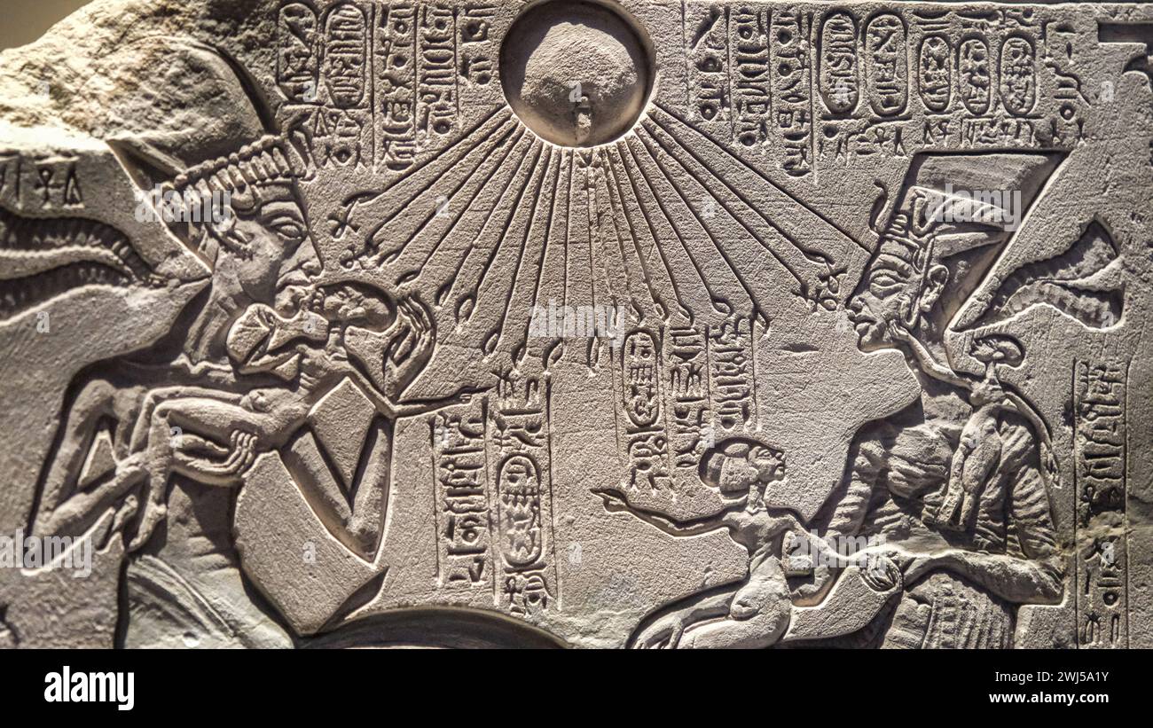 The Amarna period scene depicting the divine figure Aten with Akhenaten ...