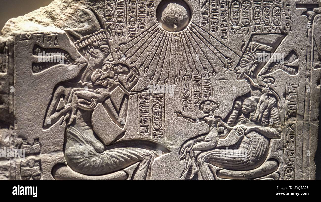 The Amarna period scene depicting the divine figure Aten with Akhenaten ...