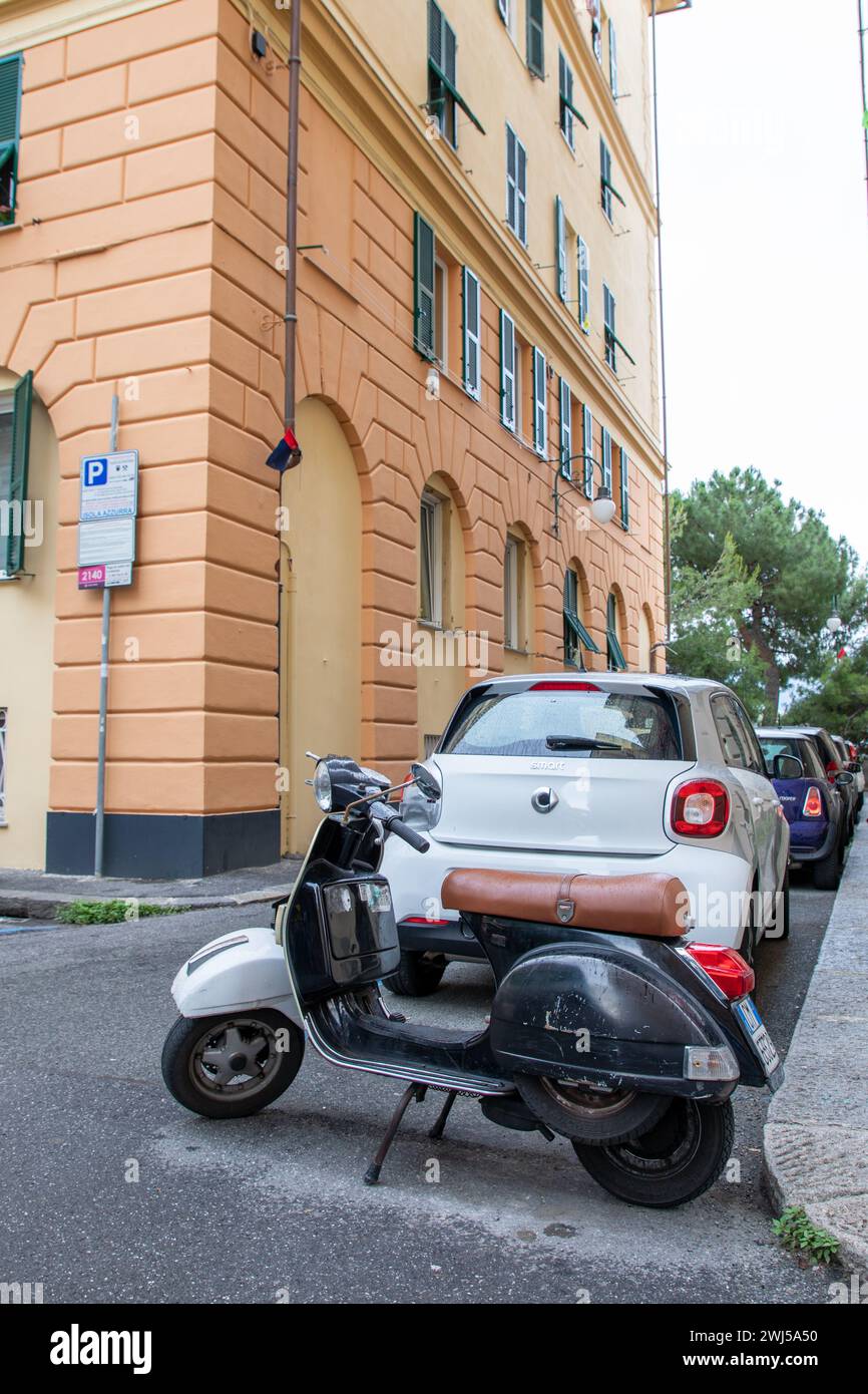Milan , italy - 02 12 2024 : vespa px 125 scooter with vintage look in city street parked near ...