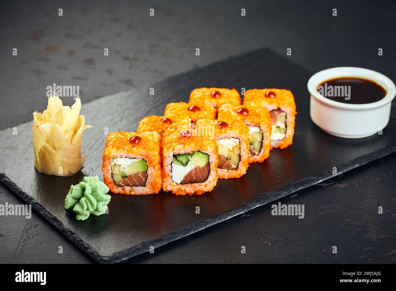 Philadelphia sushi roll with tuna, avocado, cream cheese, cucumber and ...