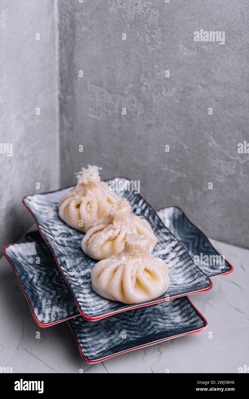 Georgian traditional khinkali dumplings with meat Stock Photo - Alamy