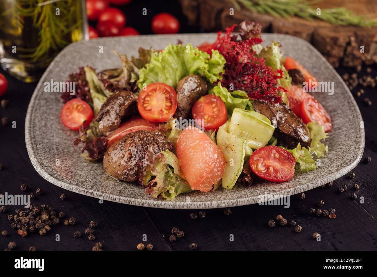 Meat and vegetable salad on plate Stock Photo - Alamy