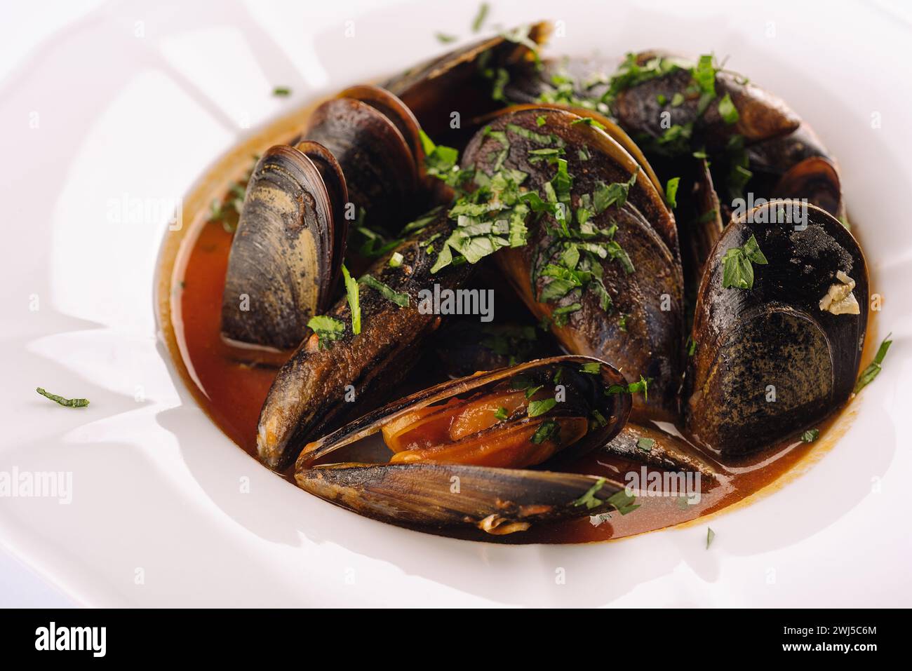 Mussels close up on white background Stock Photo - Alamy