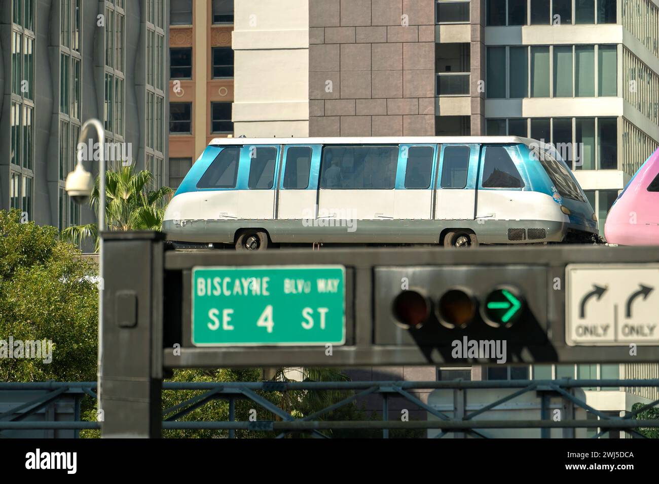 Elevated train for public transportation in Miami downtown district in ...