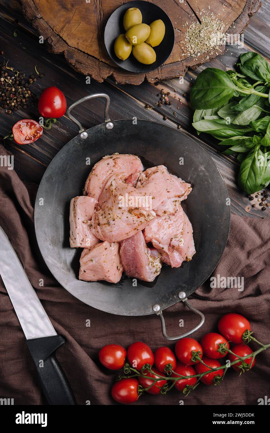 Raw pork meat heap for roast on pan Stock Photo - Alamy