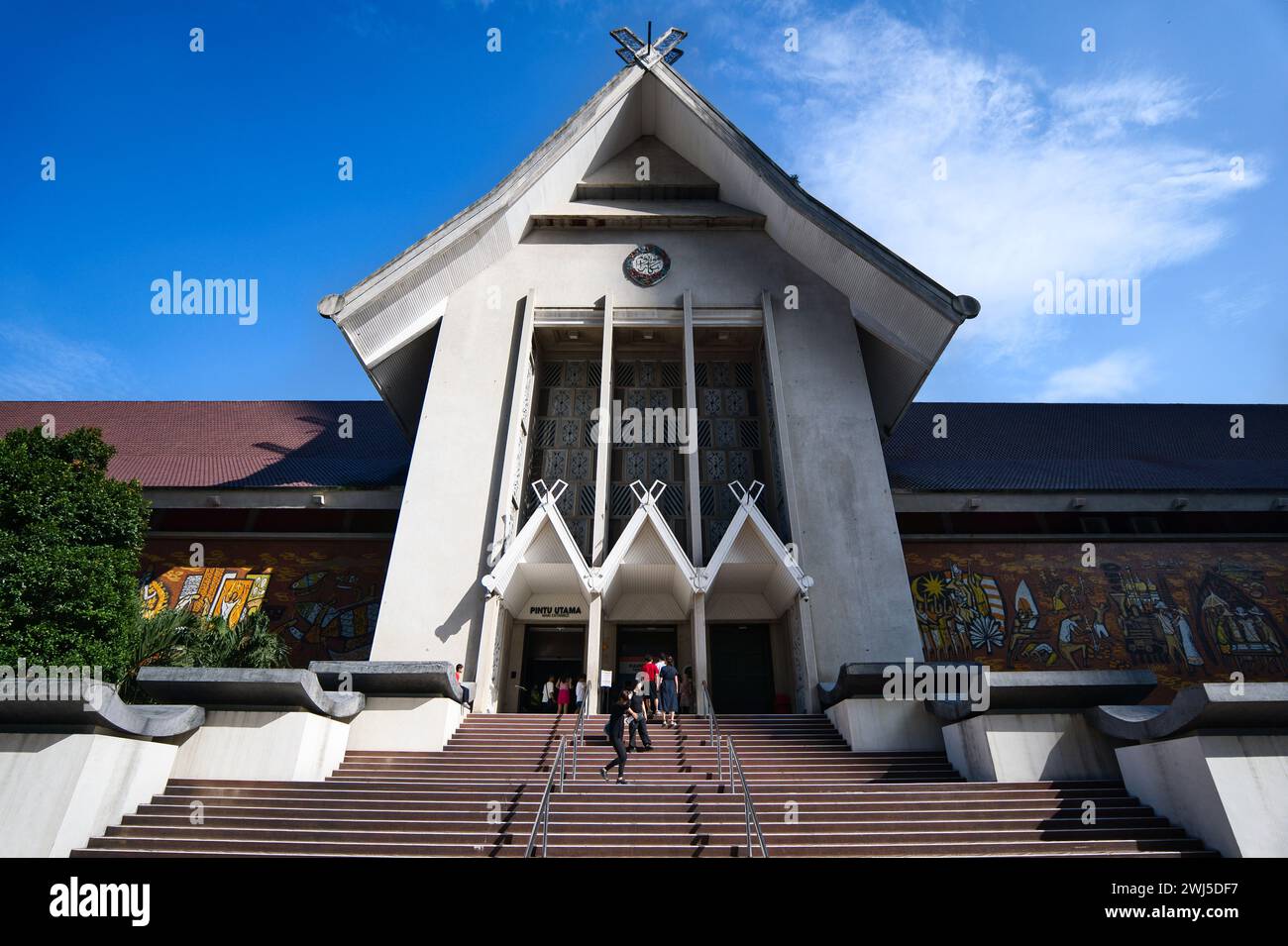 Kuala Lumpur, Malaysia - December 20, 2023: Visitors on the stairs ...