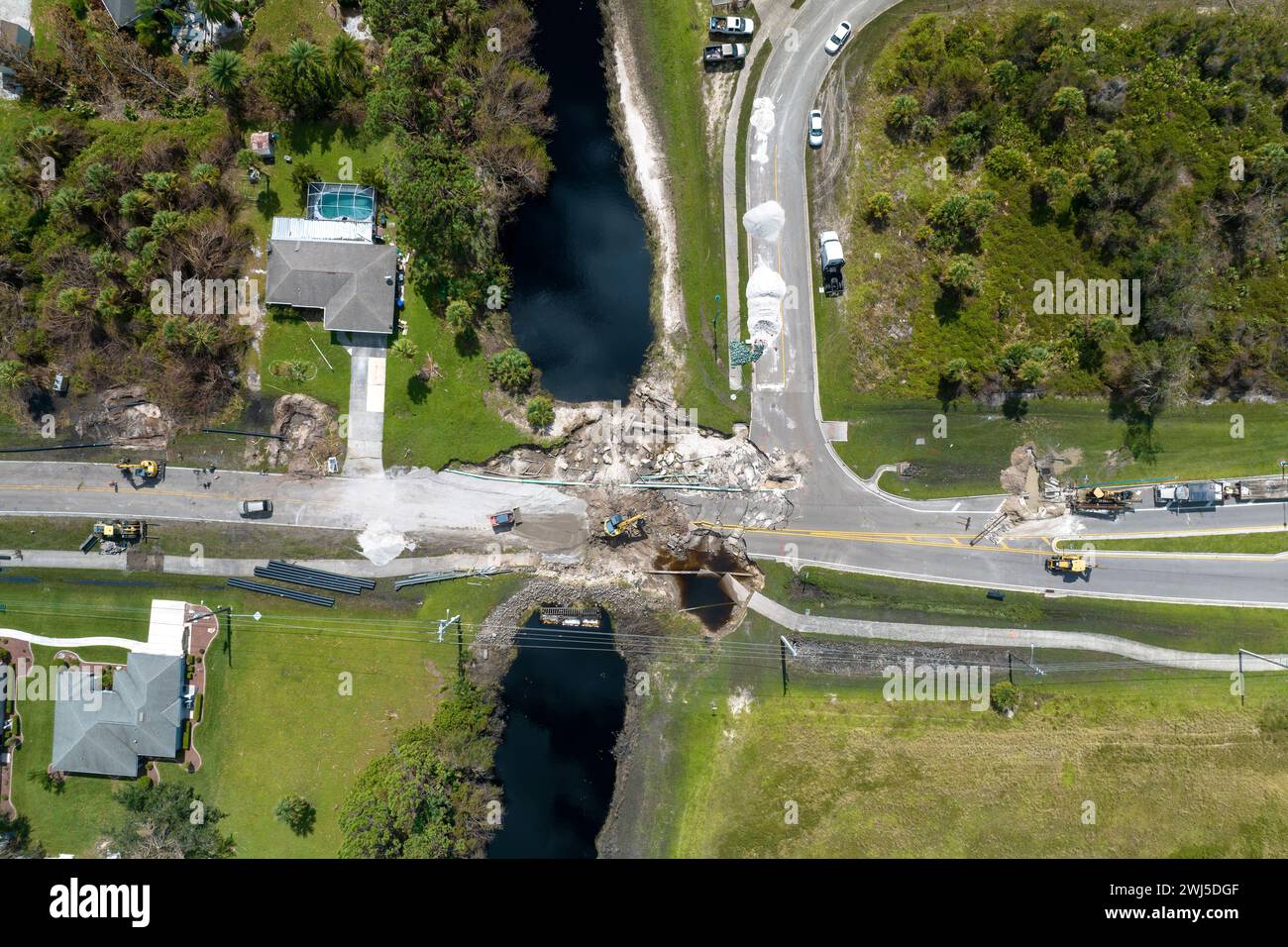 Construction equipment at roadworks site. Reconstruction of damaged ...