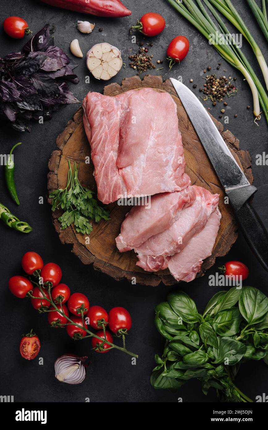 Raw pork neck meat cuts with spices Stock Photo - Alamy
