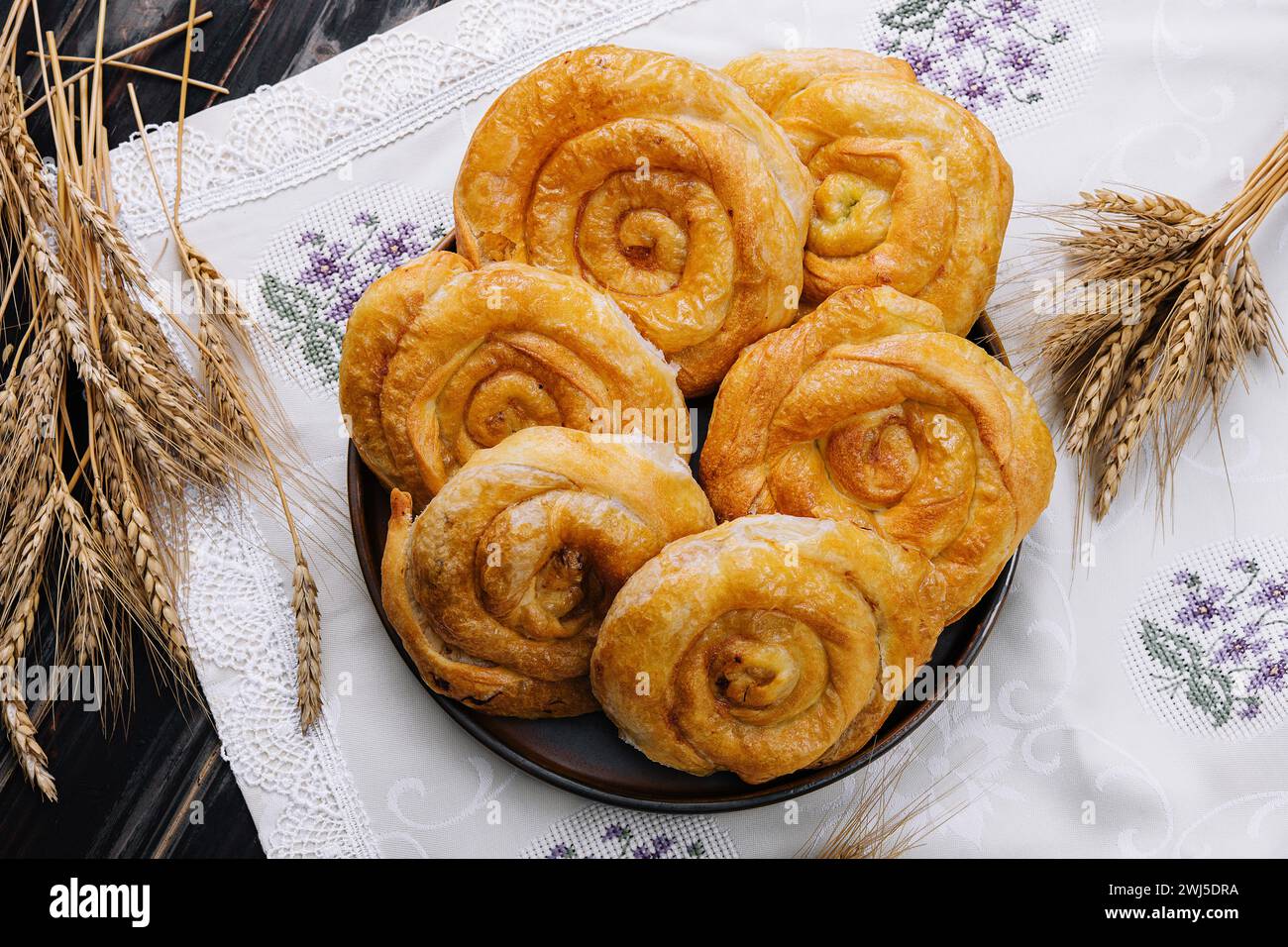 Tasty raising buns on a cloth background Stock Photo - Alamy