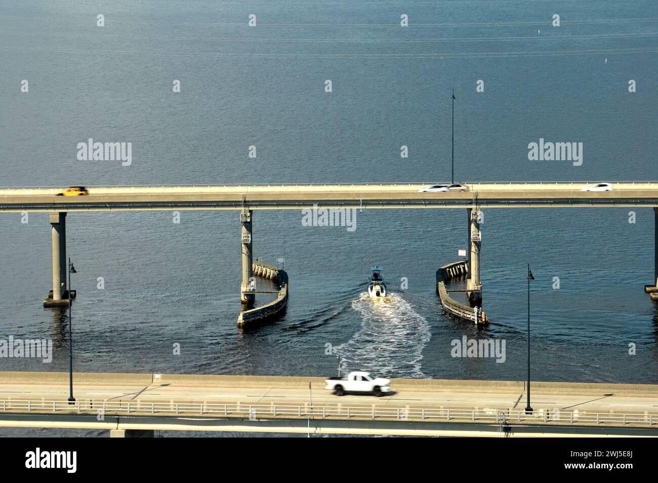 Barron Collier Bridge and Gilchrist Bridge in Florida with moving ...