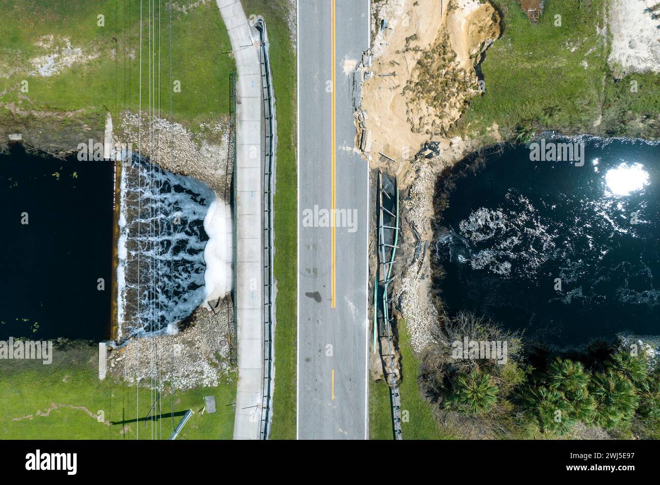 Repair of destroyed bridge after hurricane flood in Florida ...