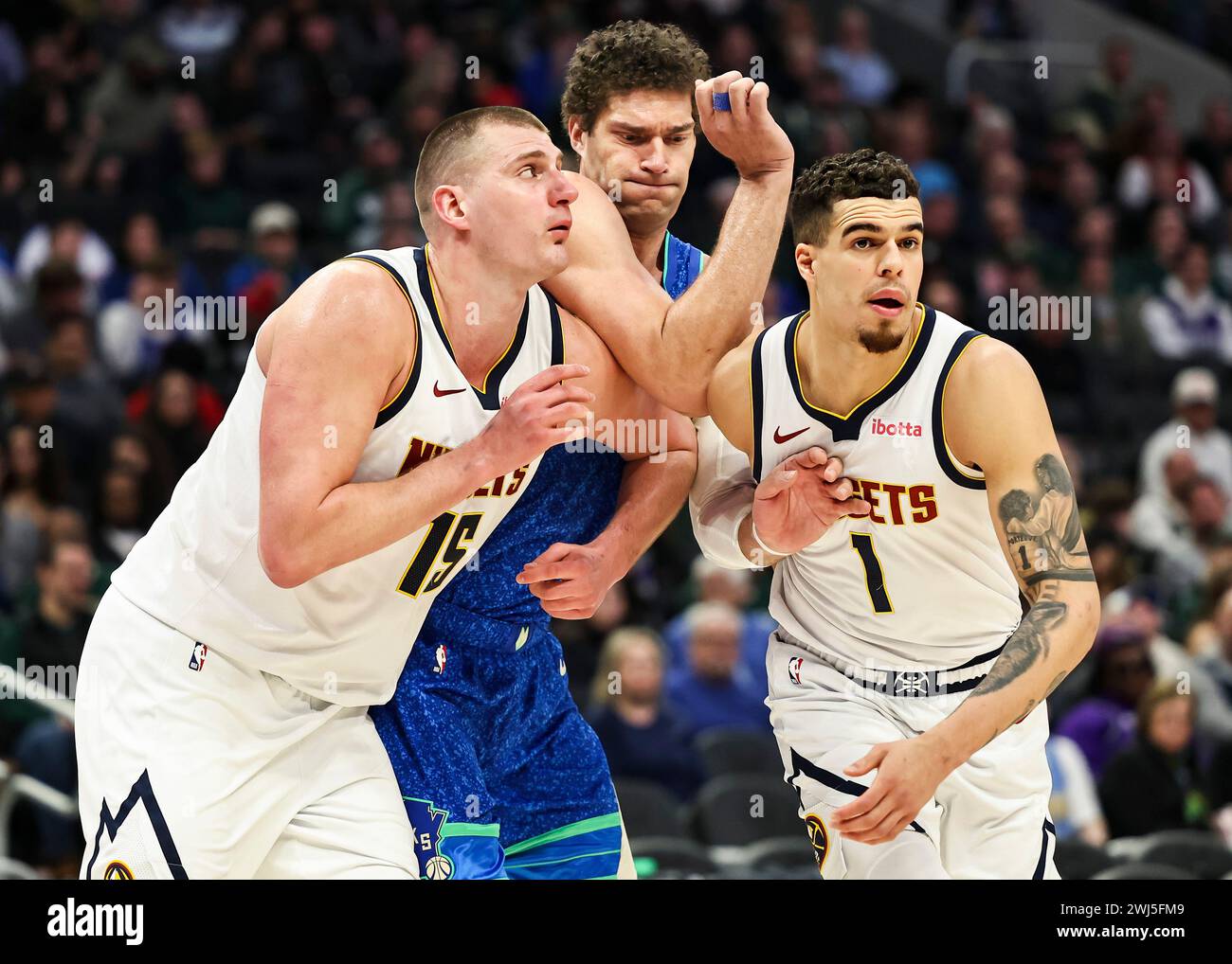 Milwaukee, USA. 12th Feb, 2024. Denver Nuggets center Nikola Jokic (L ...