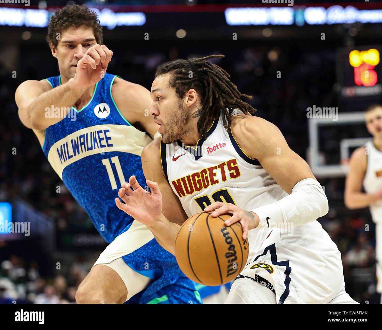 Milwaukee, USA. 12th Feb, 2024. Denver Nuggets forward Aaron Gordon (R ...