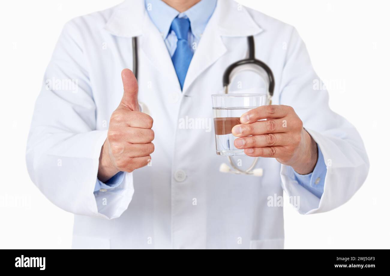 Doctor offering glass water hi-res stock photography and images - Alamy