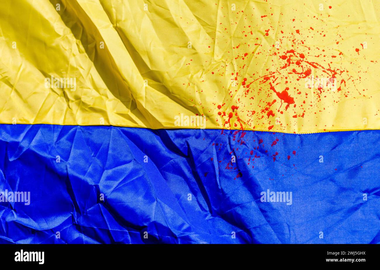 Blood stains on the flag of Ukraine Stock Photo - Alamy