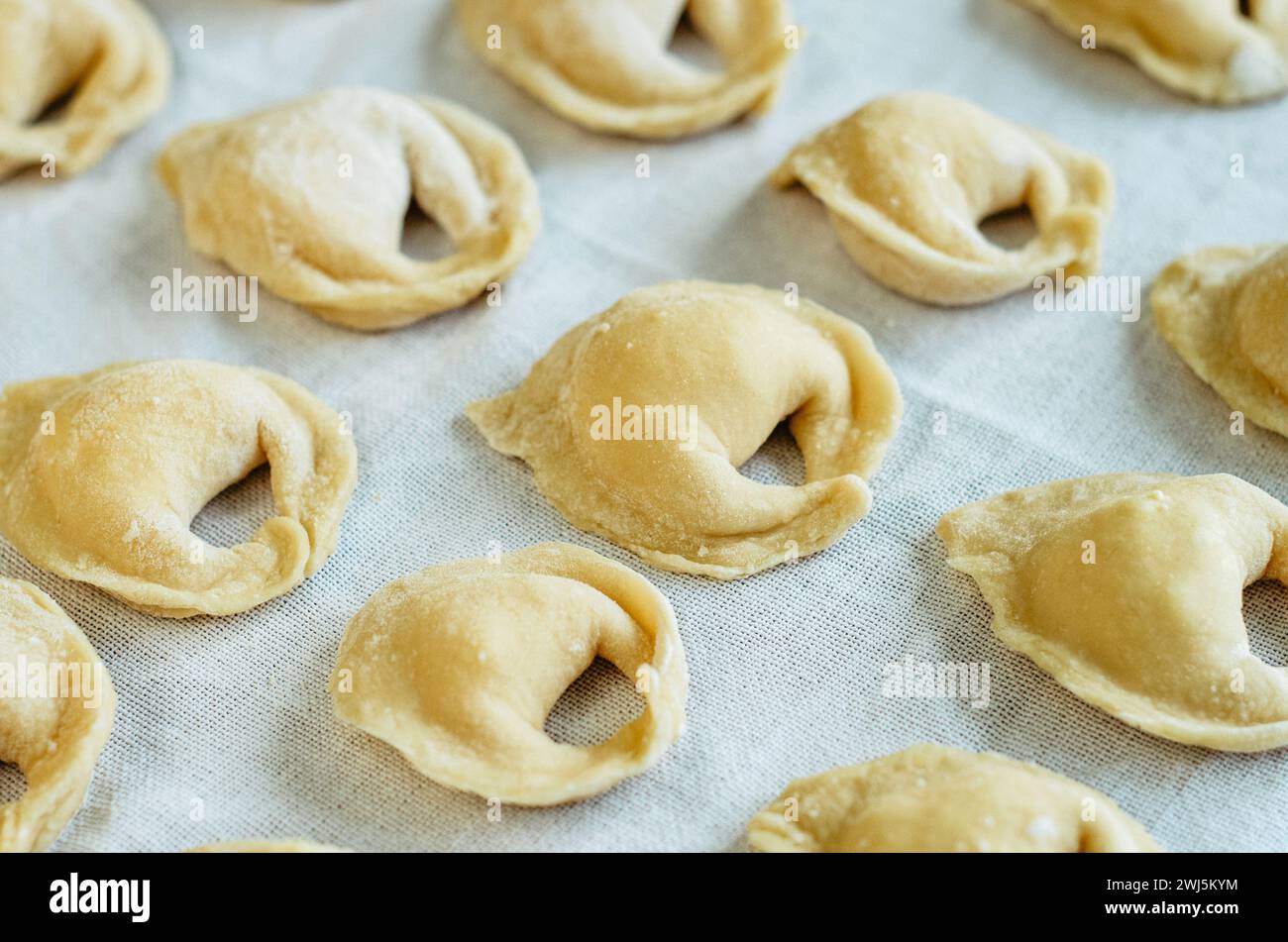 Home made dumplings on white linen cloth close up Stock Photo - Alamy
