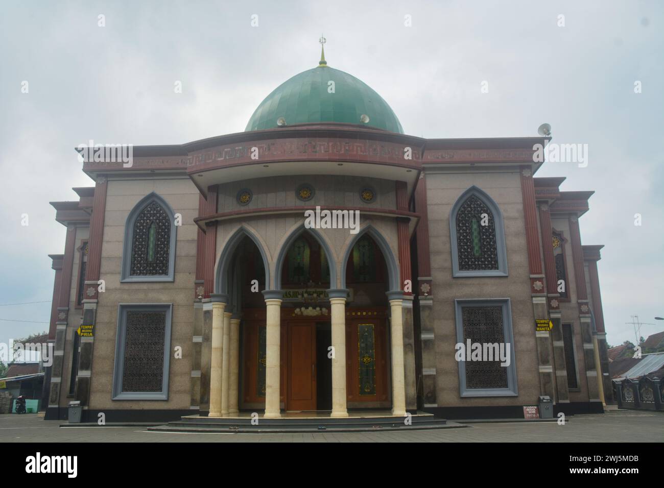The exterior of a mosque in Wonosobo, Indonesia. mas is a place of ...