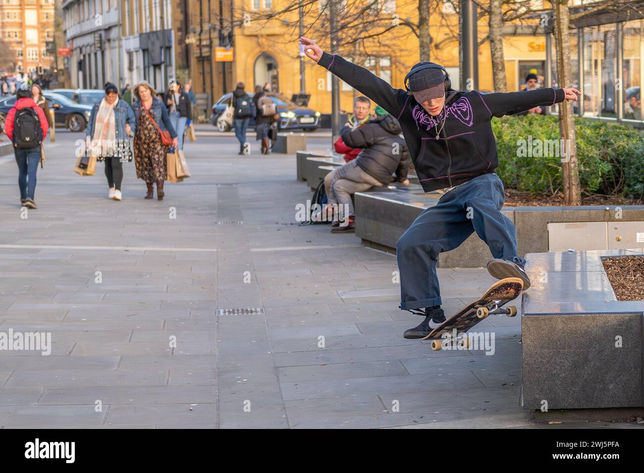 Boy skateboarding on park pathway hi-res stock photography and images ...