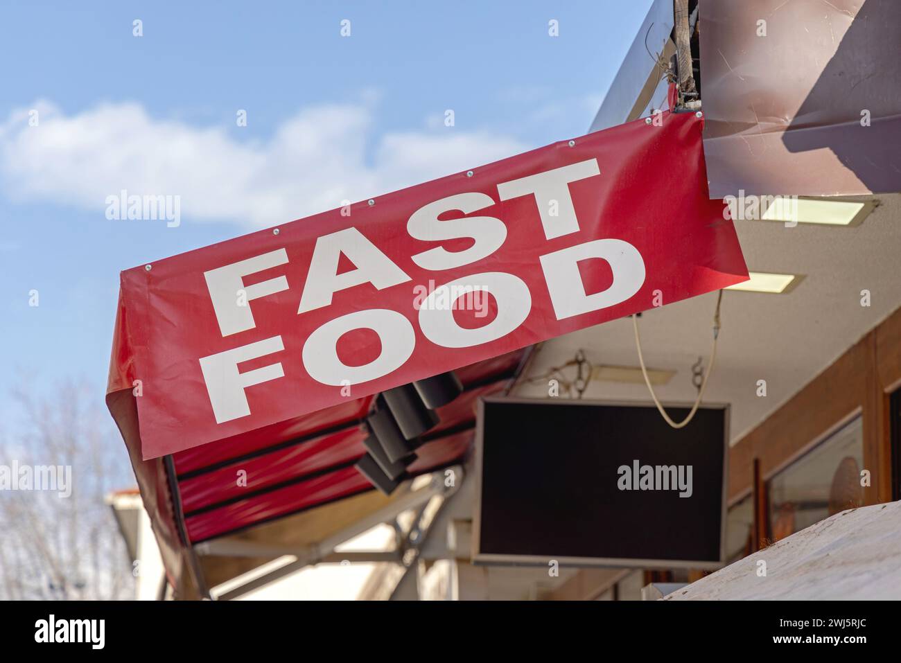 Fast Food Sign at Canopy in Front of Restaurant Stock Photo - Alamy