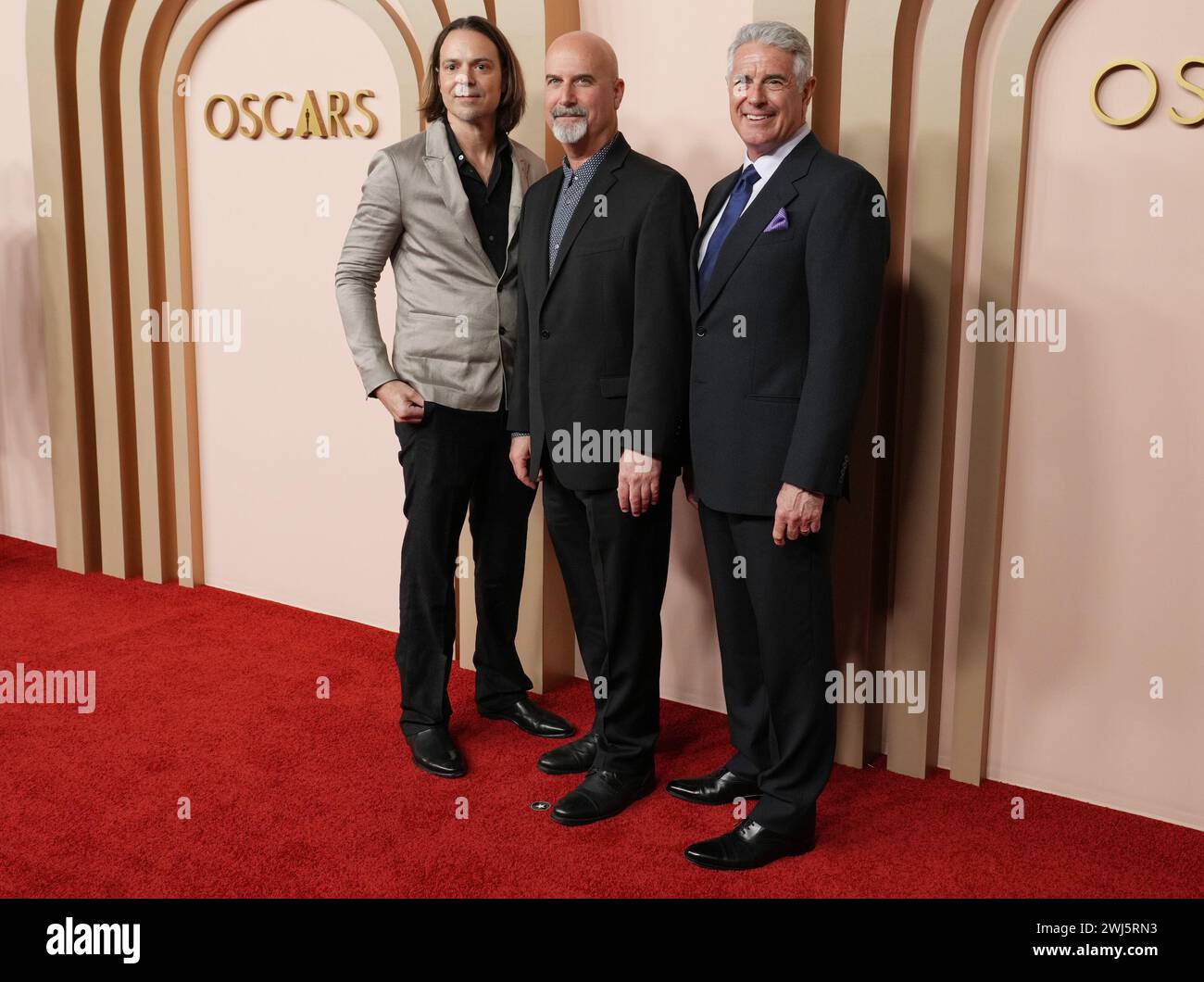 Los Angeles, USA. 12th Feb, 2024. (L-R) Jason Ruder, Tom Ozanich, Dean ...