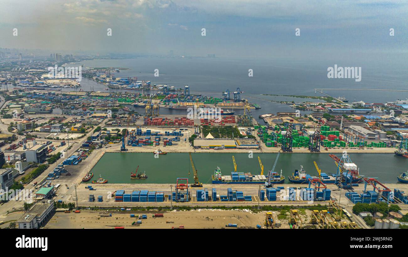 Aerial drone of container terminal with cargo ships. Tanjung Priok sea ...