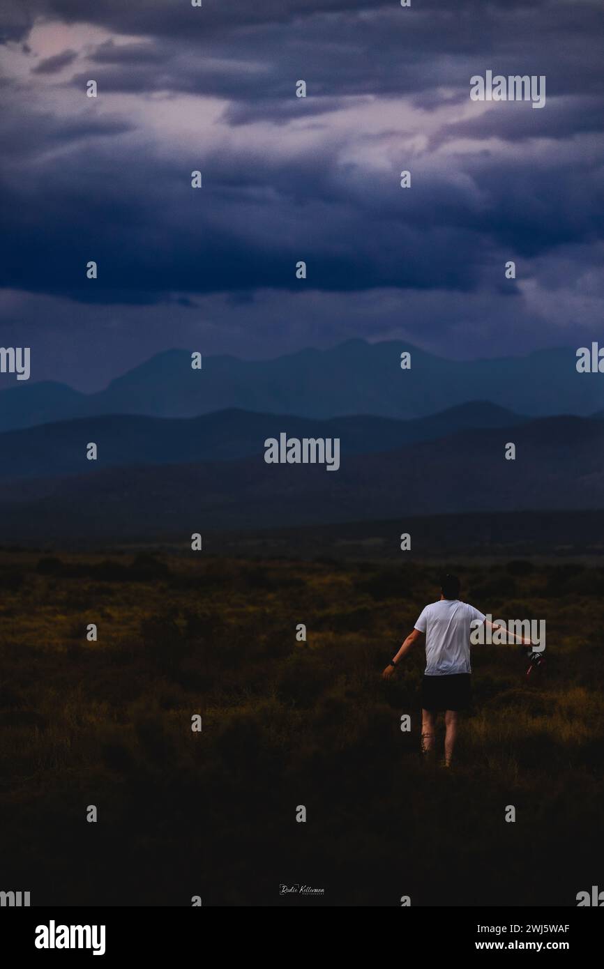 A human appreciating nature, arms open to the skies Stock Photo - Alamy
