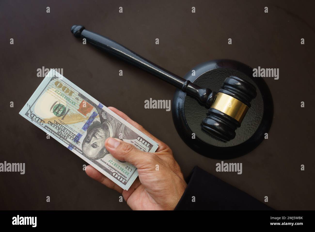 Gavel and bank noted on close up shot taken from top Stock Photo - Alamy