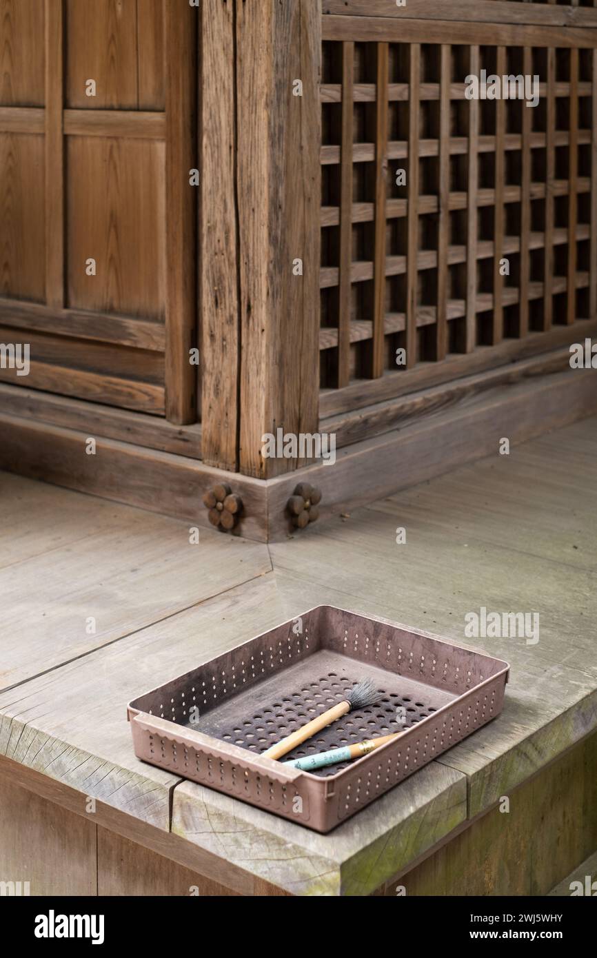 Detail of writing implements left as offerings in Sakurayama Hachimangu ...