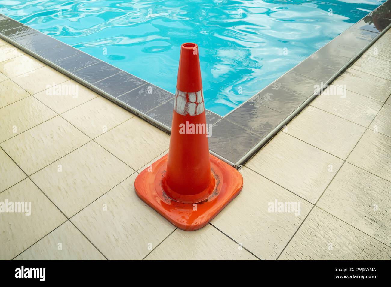safety traffic cone at swimming pool Stock Photo - Alamy