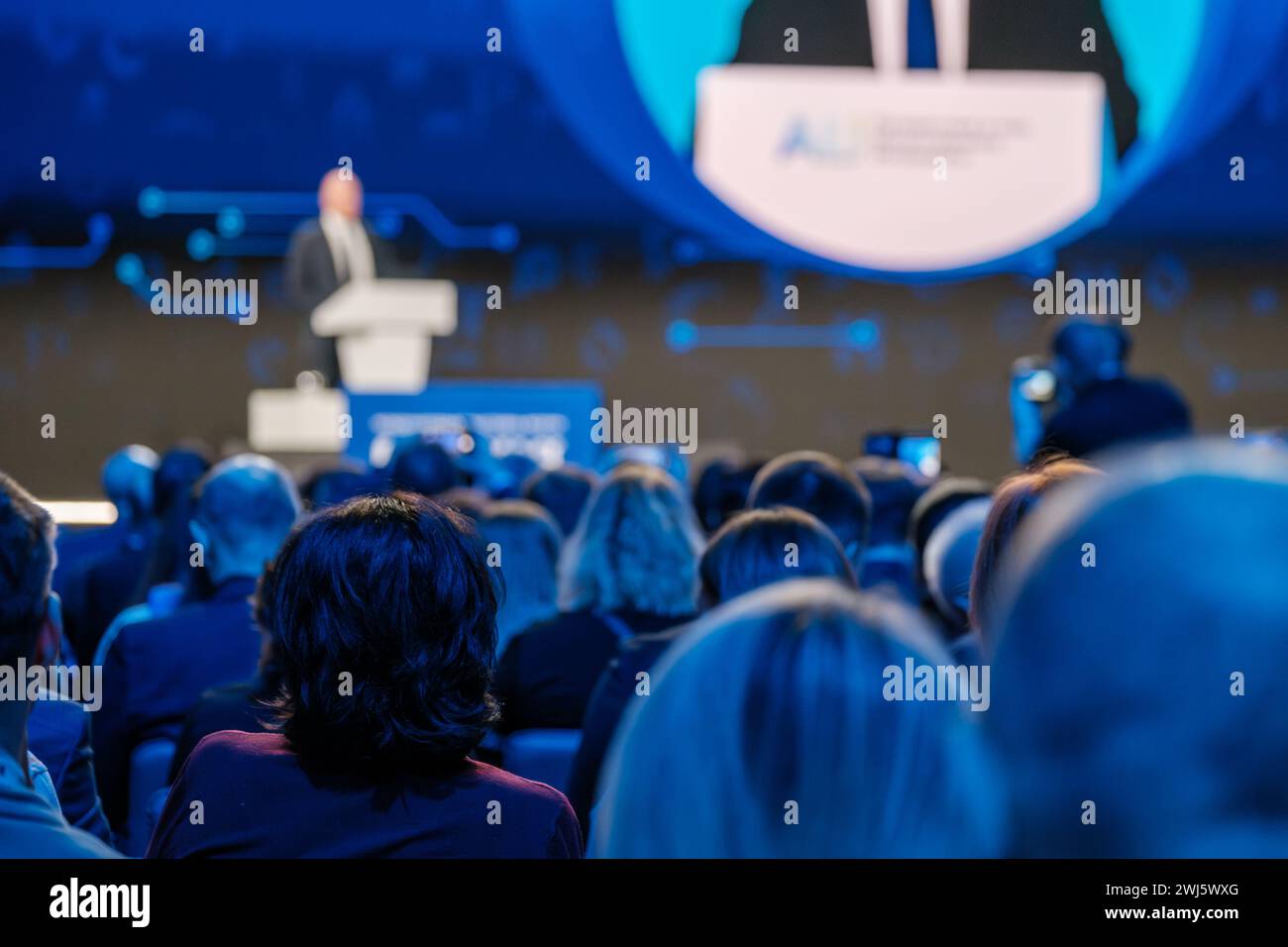 Focused audience listening intently to a speaker at a professional ...