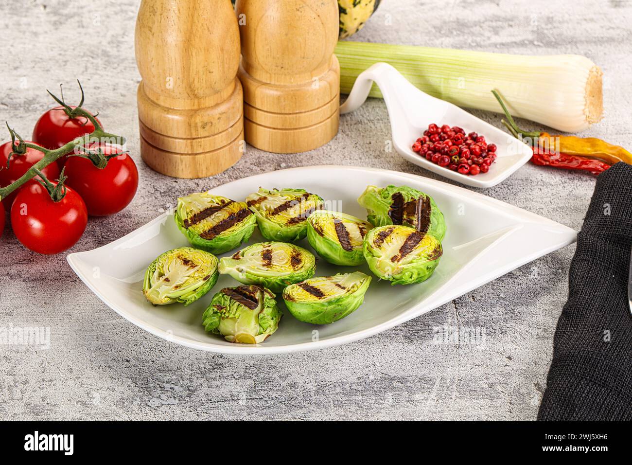 Vegan cuisine Grilled green brussel sprout cabbage Stock Photo - Alamy