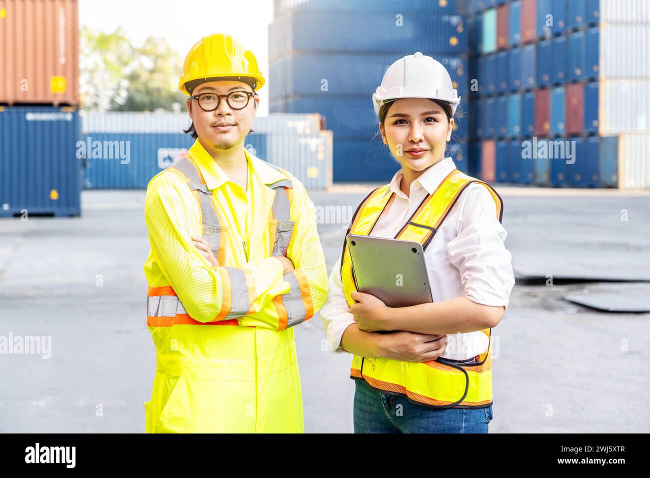 The two Southeast Asian engineers posing confidently in front of ...