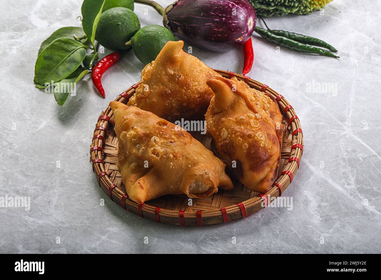 Indian cuisine - fries crispy stuffed samosa Stock Photo - Alamy