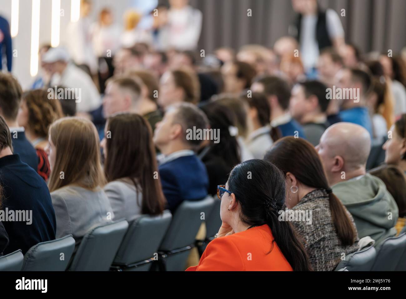 Communication crowd assembly hall sitting hi-res stock photography and ...