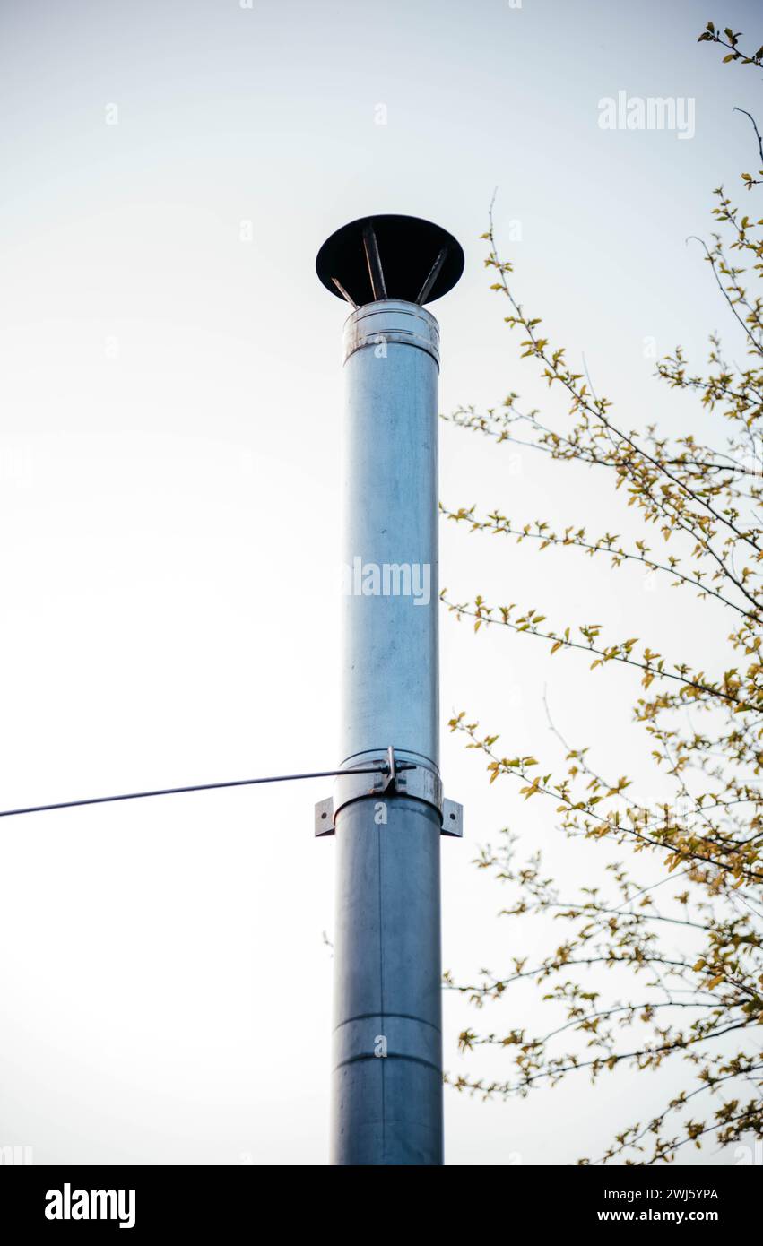 Metal structure of a bathhouse chimney Stock Photo - Alamy