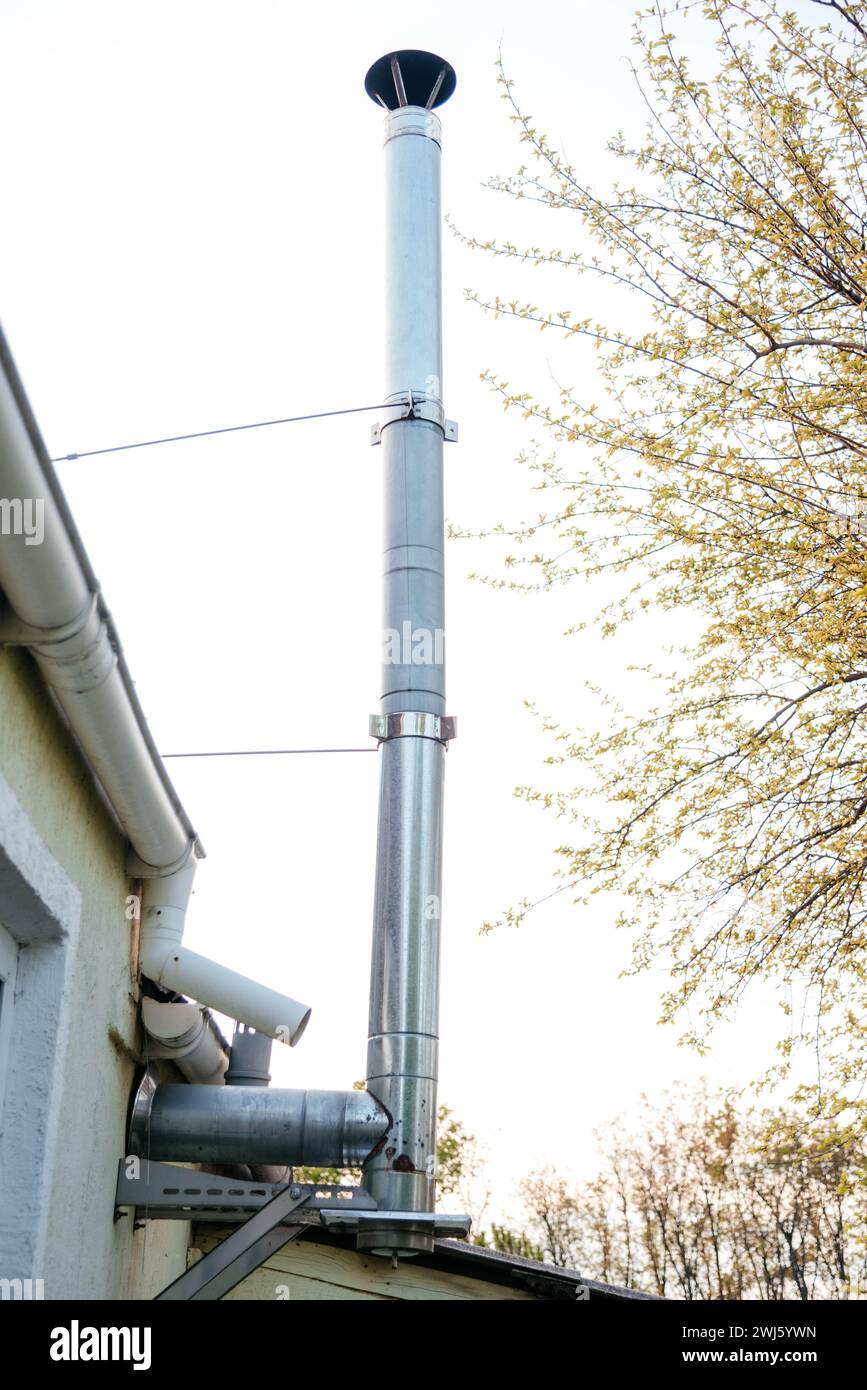 Metal structure of a bathhouse chimney Stock Photo - Alamy