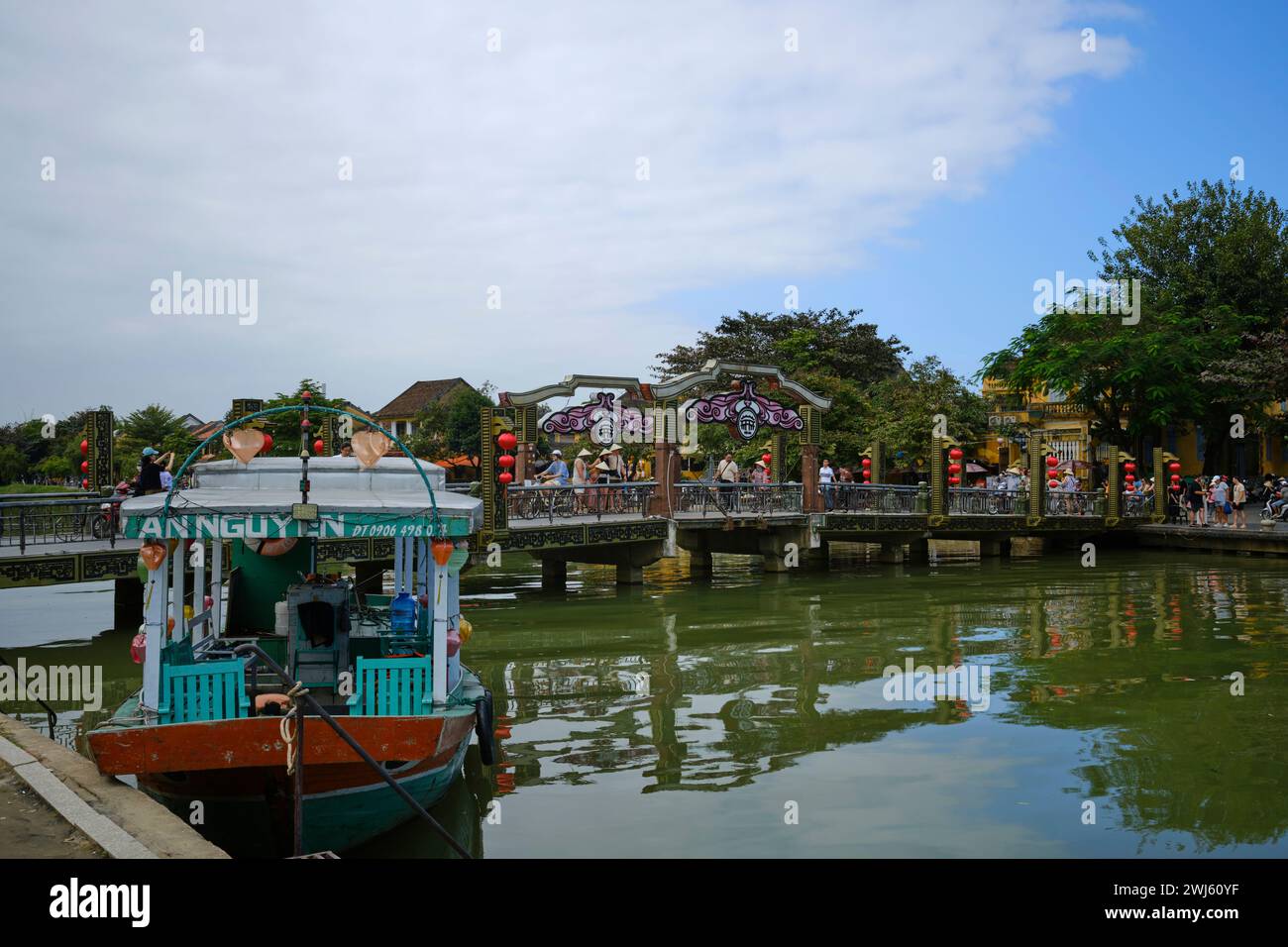 Jan 2024, Boat moored on the Thu Bon river next to An Hoi bridge, Hoi ...