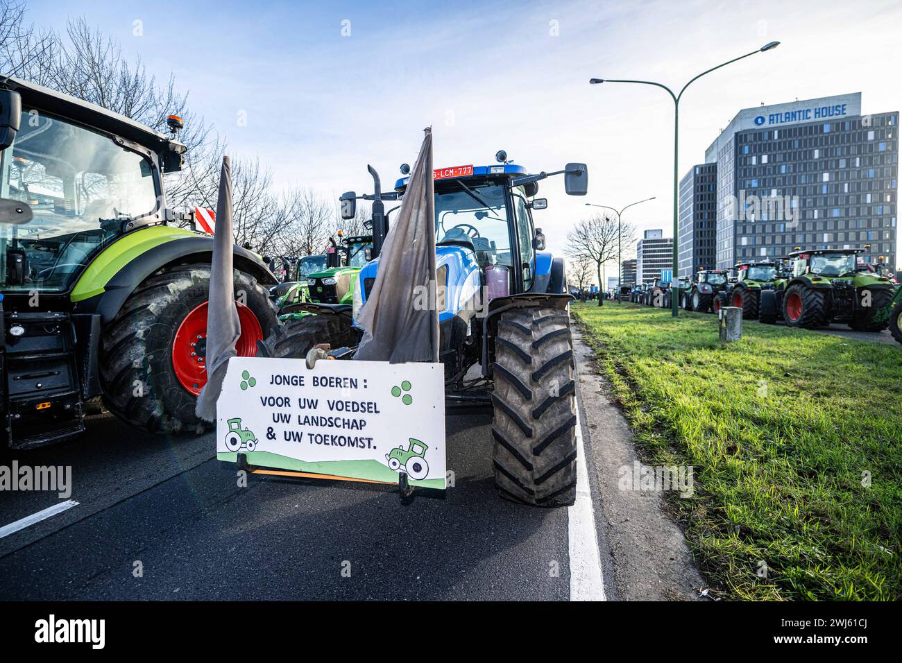 Antwerp, Belgium. 13th Feb, 2024. Farmers take their tractors to the ...