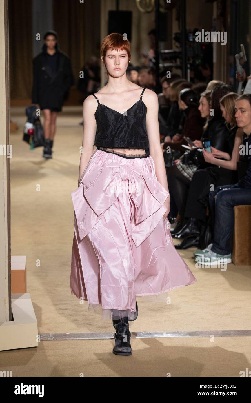 New York, USA. 12th Feb, 2024. A model walks on the runway at the Coach ...